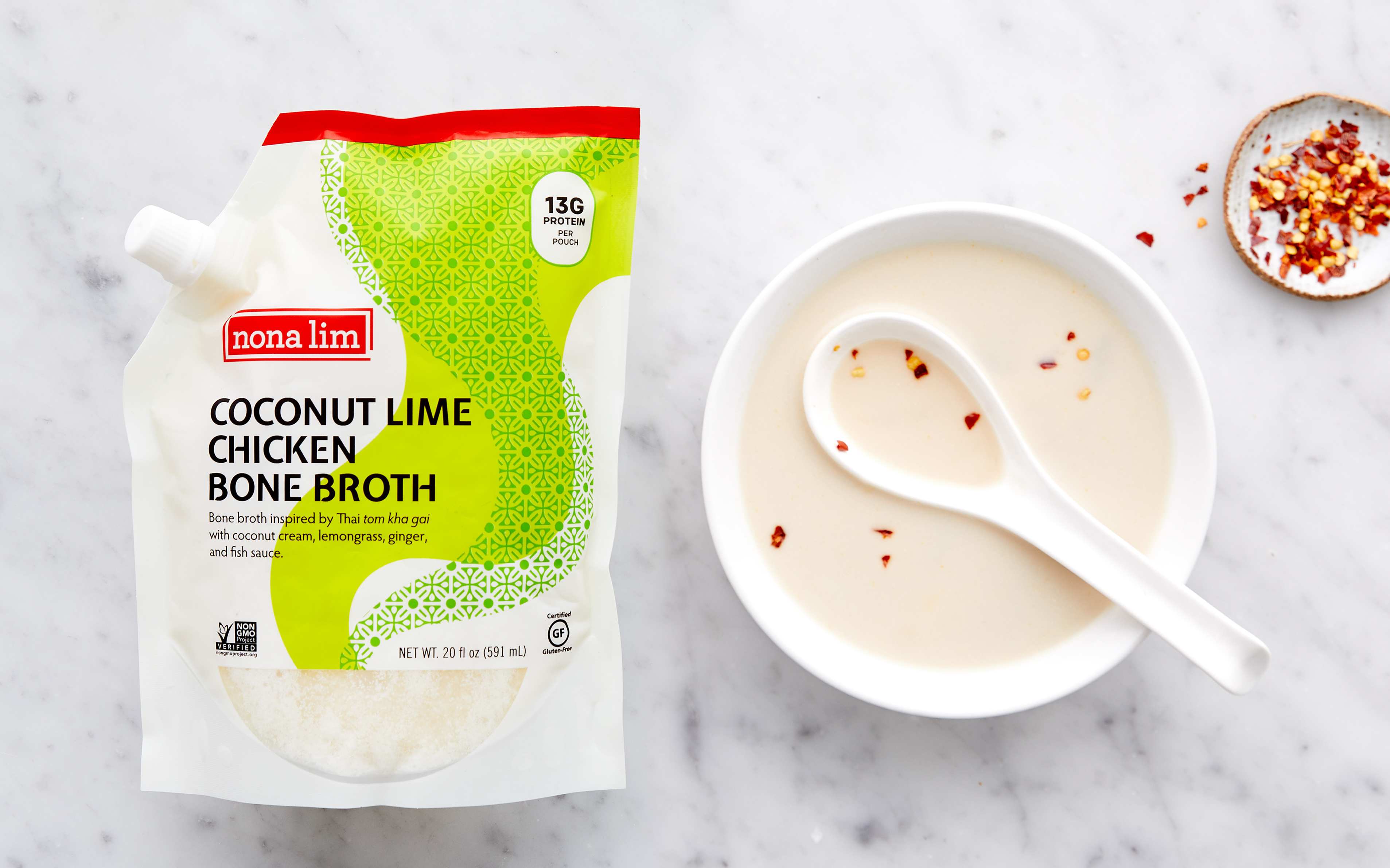 Coconut Lime Chicken Bone Broth | 20 fl oz | Nona Lim | Good Eggs