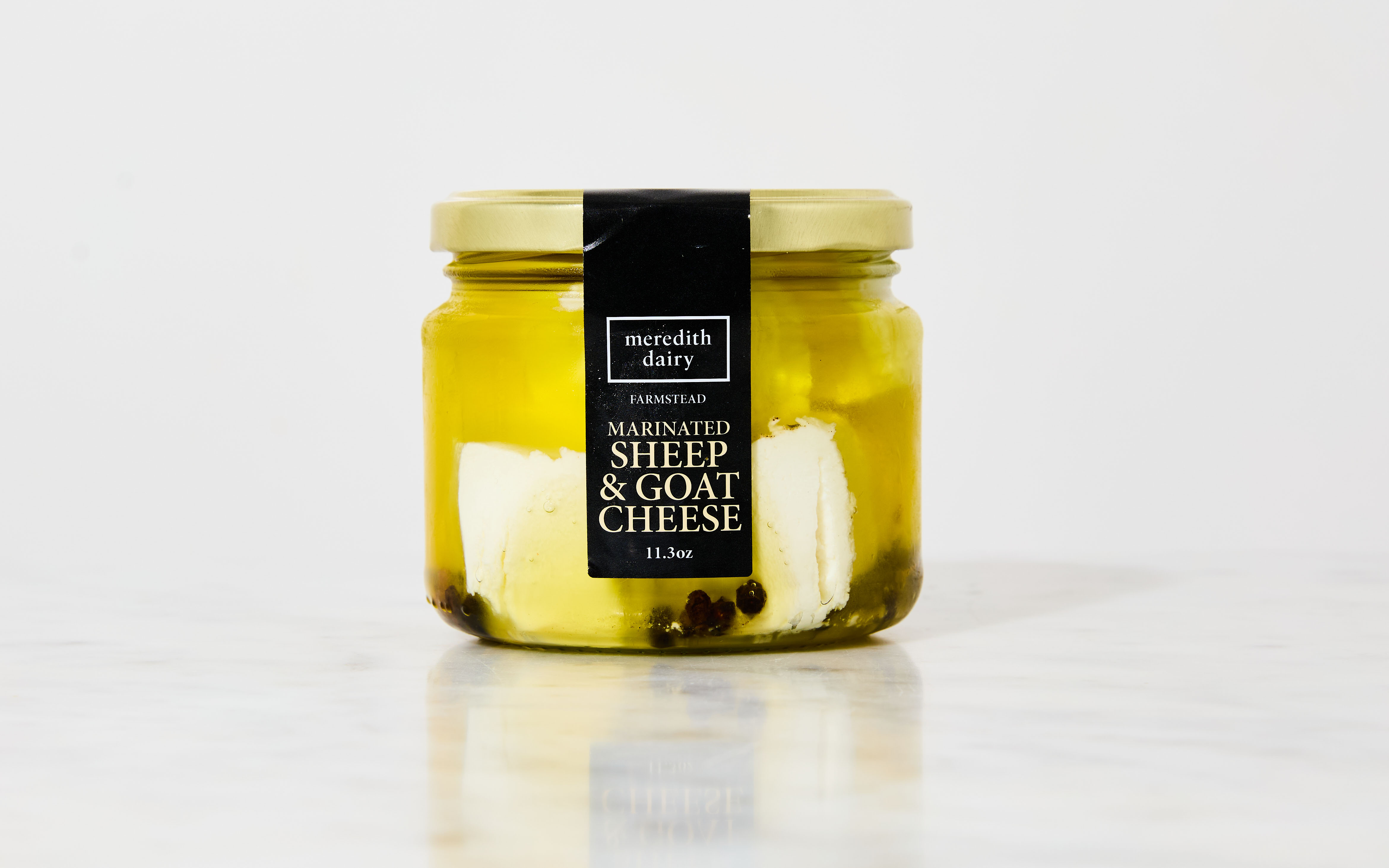 Marinated Sheep & Goat Cheese | 11.3 oz | Meredith Dairy | Good Eggs