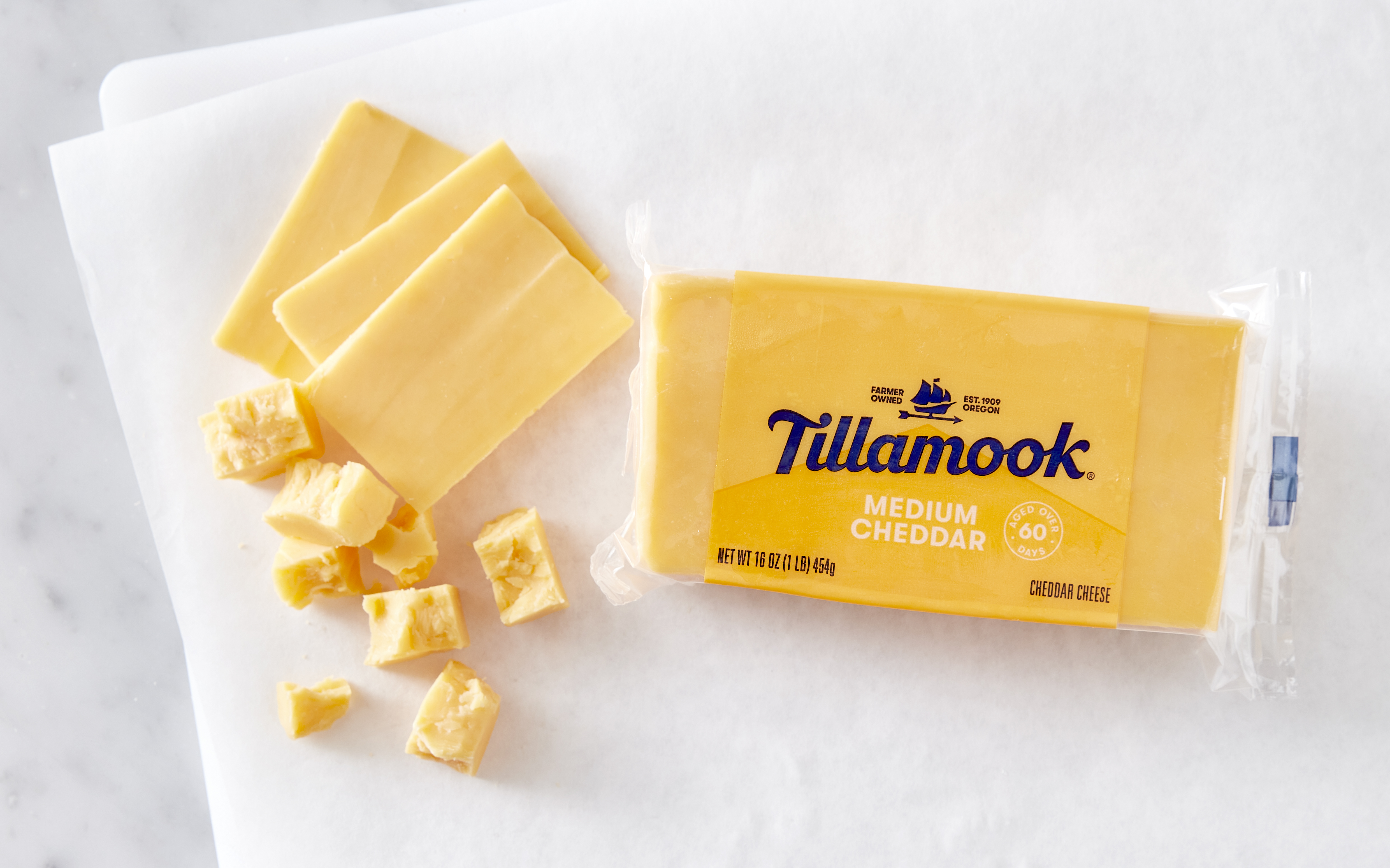 Medium Cheddar Cheese Block | 16 oz | Tillamook | Good Eggs